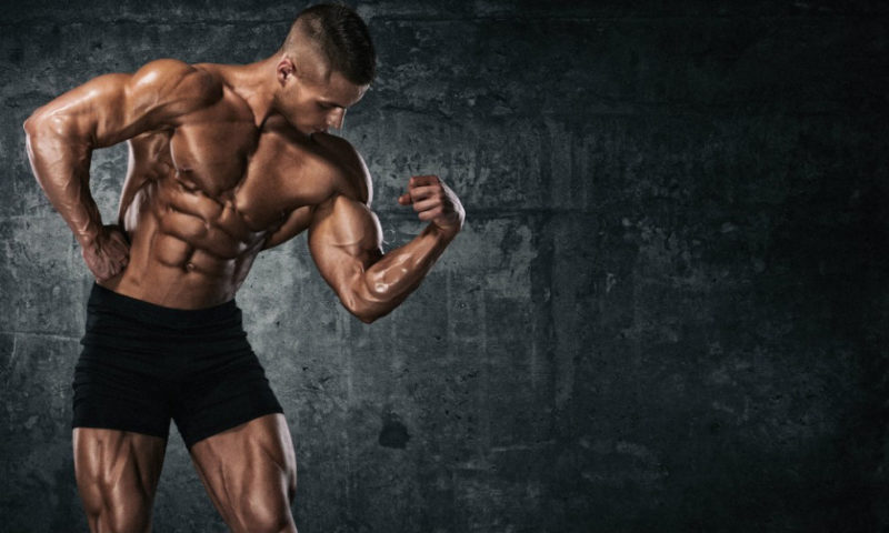 Bodybuilder-Flexing-Bicep | MuscleHack by Mark McManus